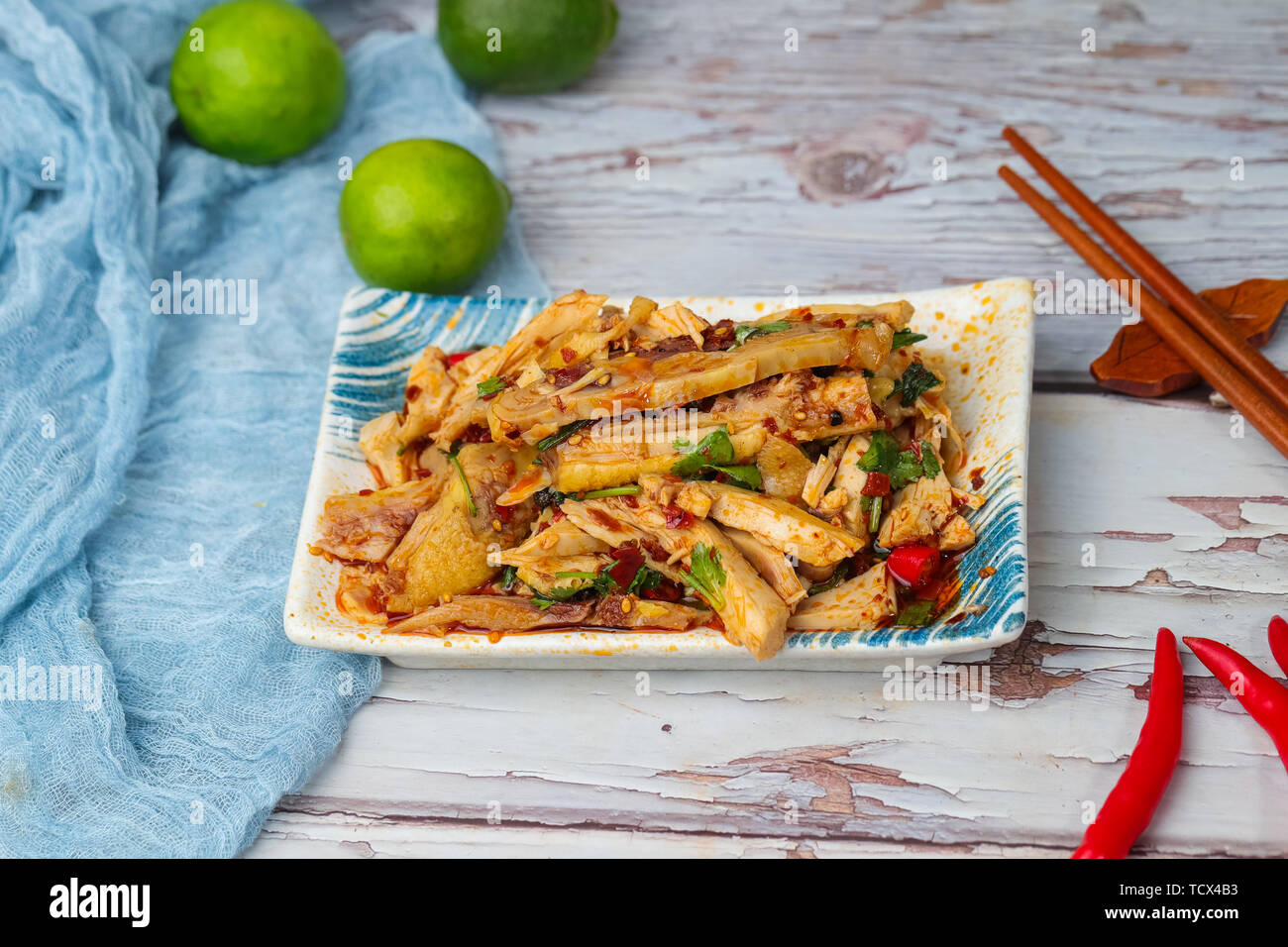drooling chicken, stick chicken Stock Photo - Alamy