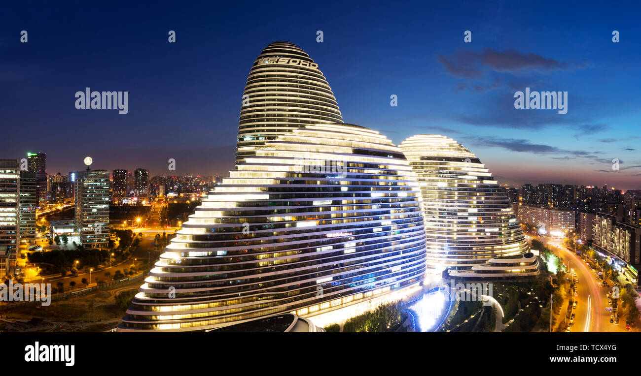 ityscape and famous landmark building,WangJing Soho at night Stock ...