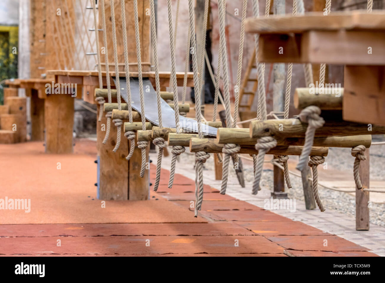 Rope bridge in Indoor adventure park as concept for balance in business ...