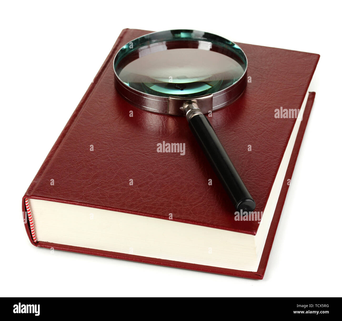 Magnifying glass and book isolated on white Stock Photo - Alamy