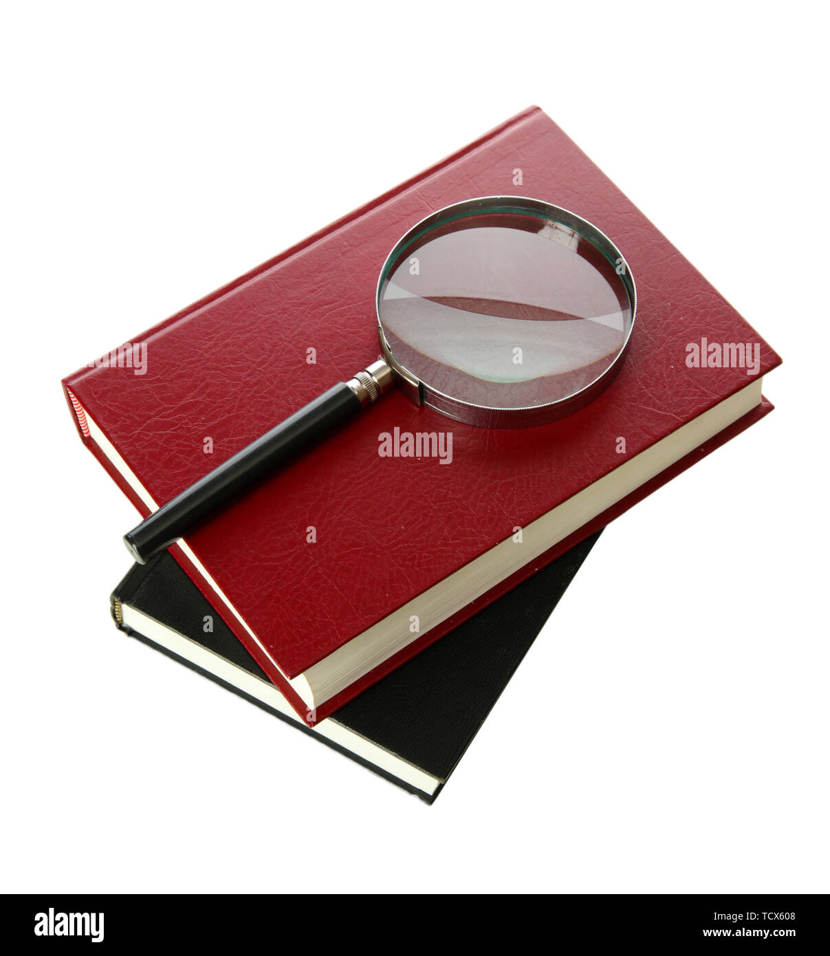 Magnifying glass and book isolated on white Stock Photo - Alamy