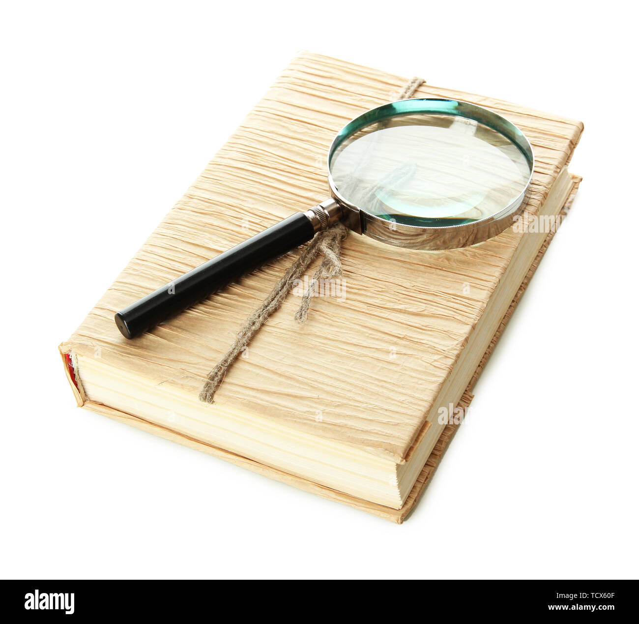 Magnifying glass and book isolated on white Stock Photo - Alamy