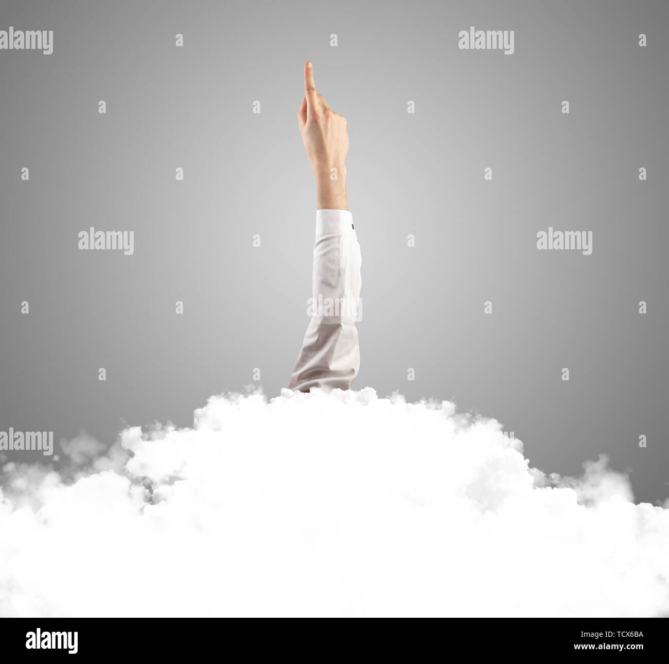 Hand breaking out from the cloud Stock Photo - Alamy