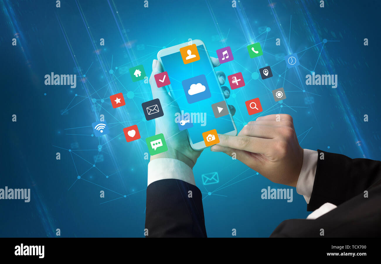 Female hand using smartphone with colorful application icons around ...