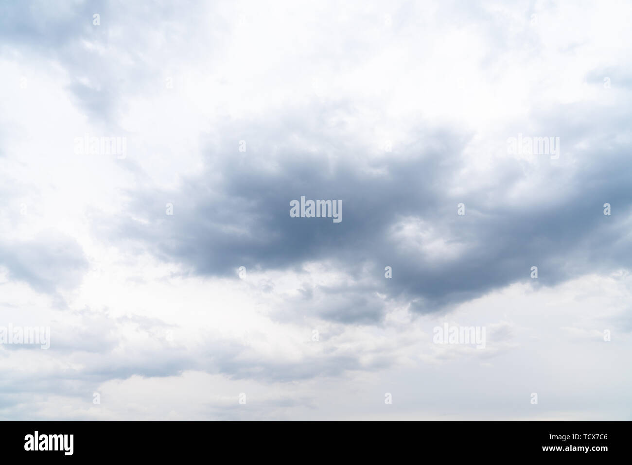 Thick clouds floating in sky hi-res stock photography and images - Alamy