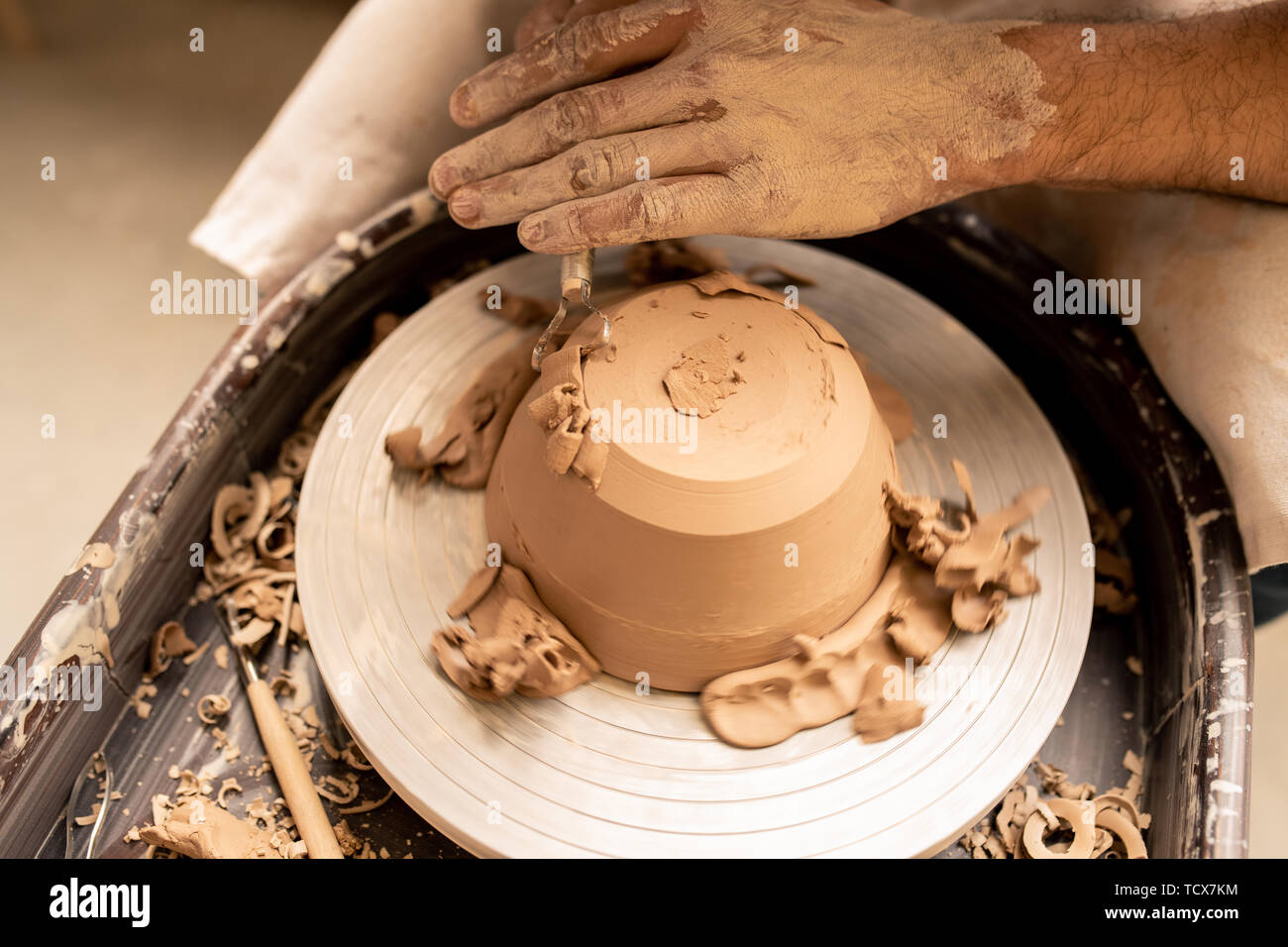 Processing clay bowl Stock Photo - Alamy