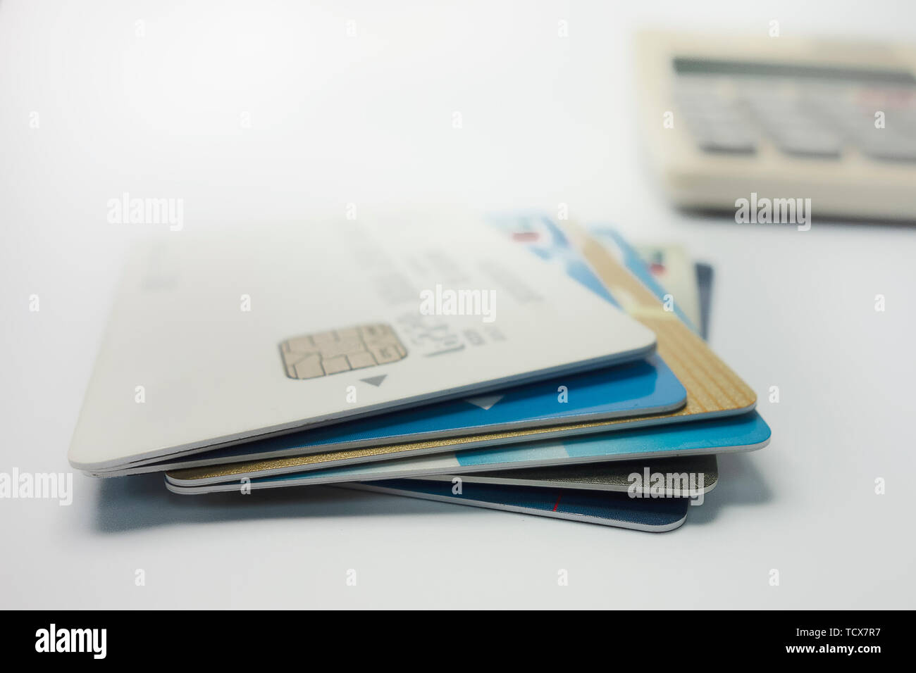 Multiple bank cards and calculators Stock Photo - Alamy