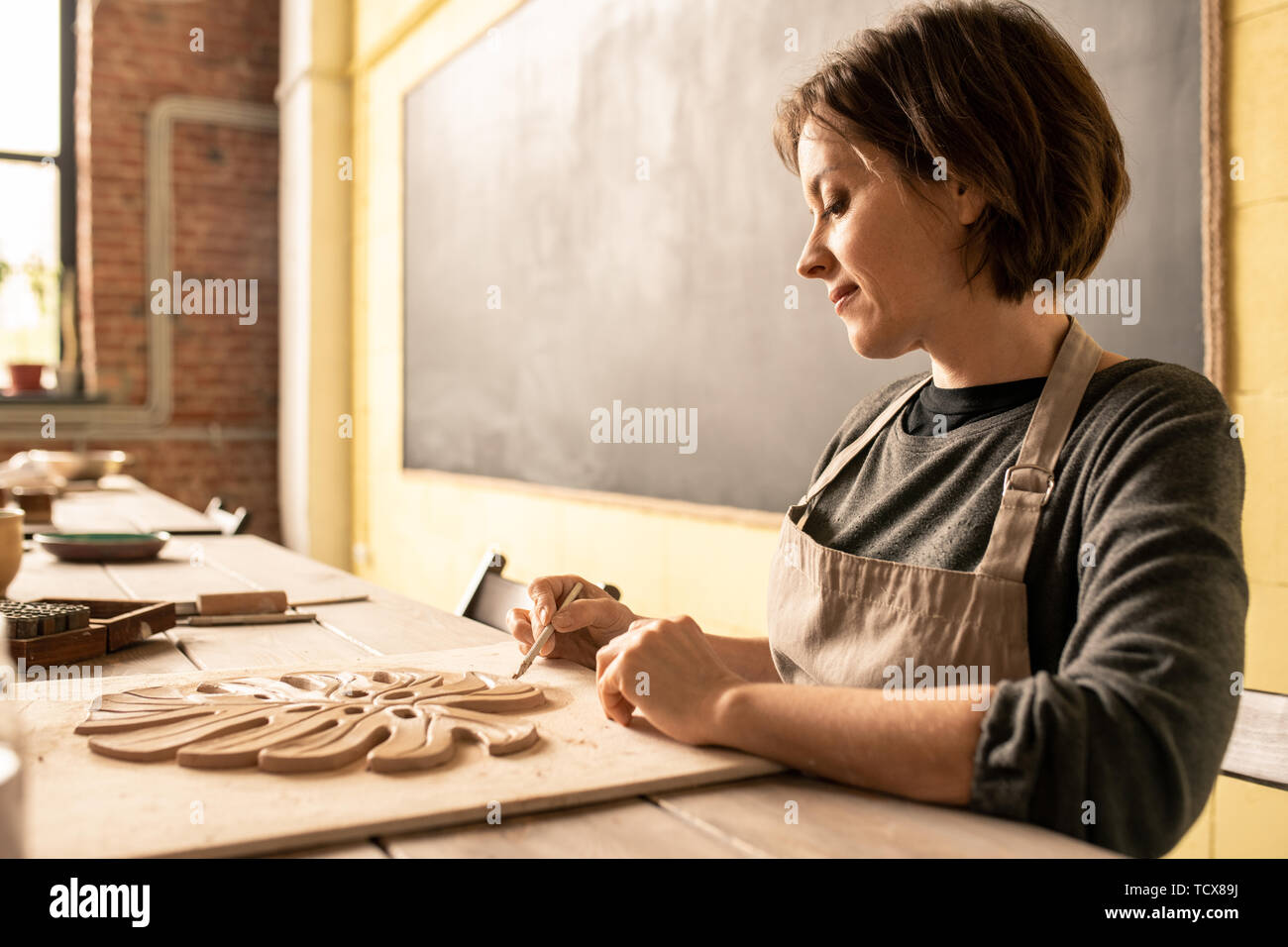 Creative female at work Stock Photo - Alamy