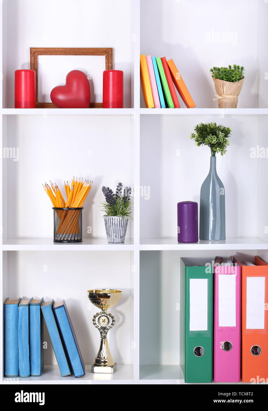 Beautiful white shelves with different home related objects Stock Photo ...