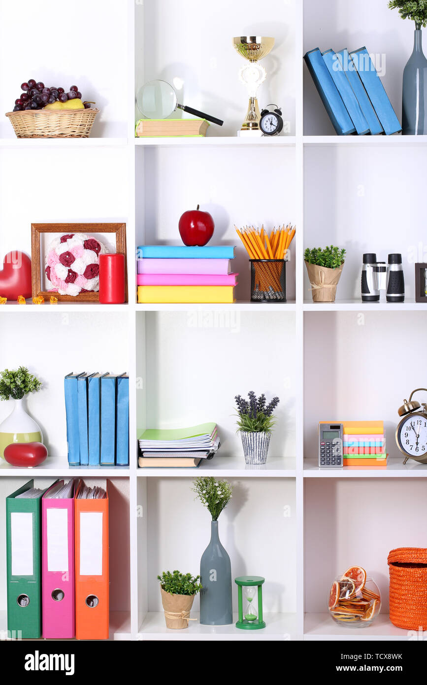 Beautiful white shelves with different home related objects Stock Photo ...