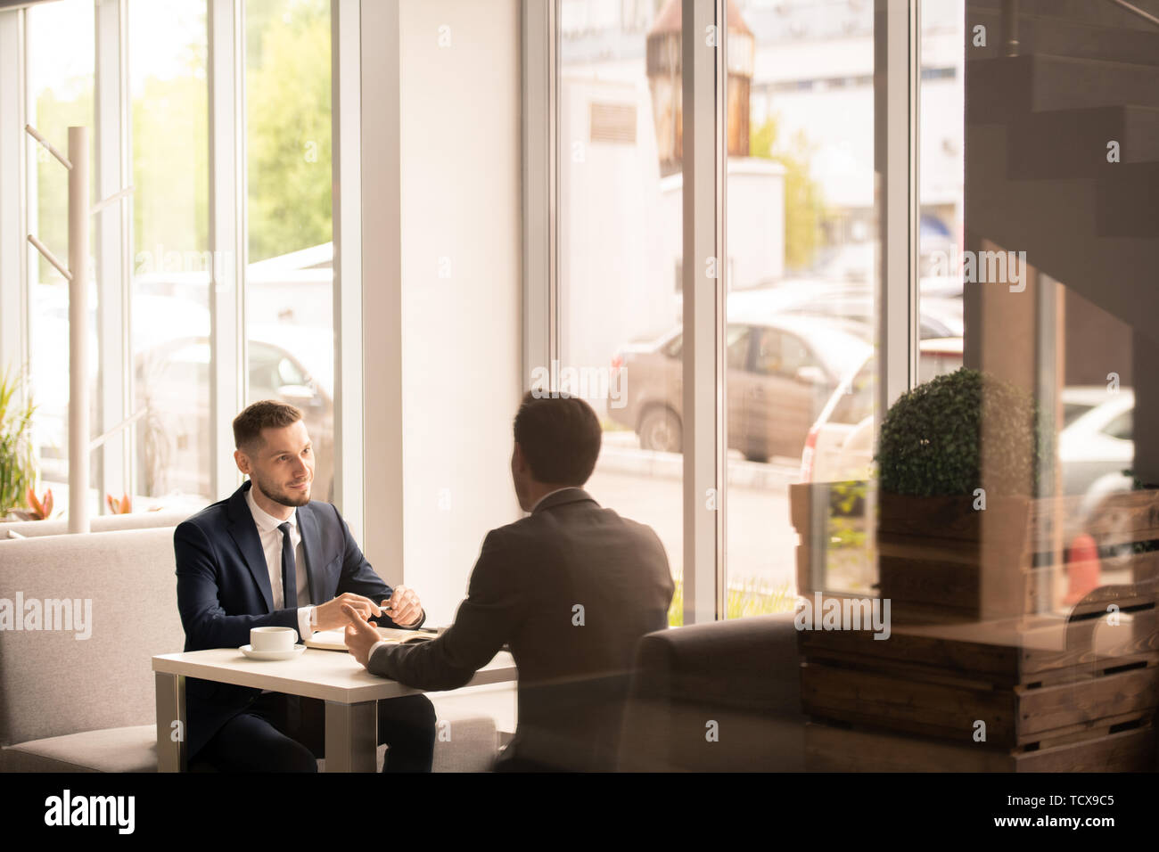 Interview in restaurant Stock Photo - Alamy