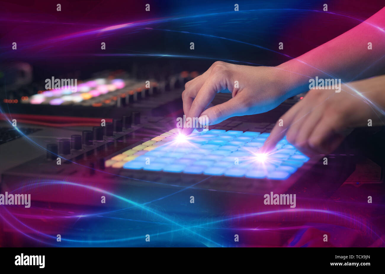 Hand mixing music on midi controller with wave vibe concept Stock Photo ...