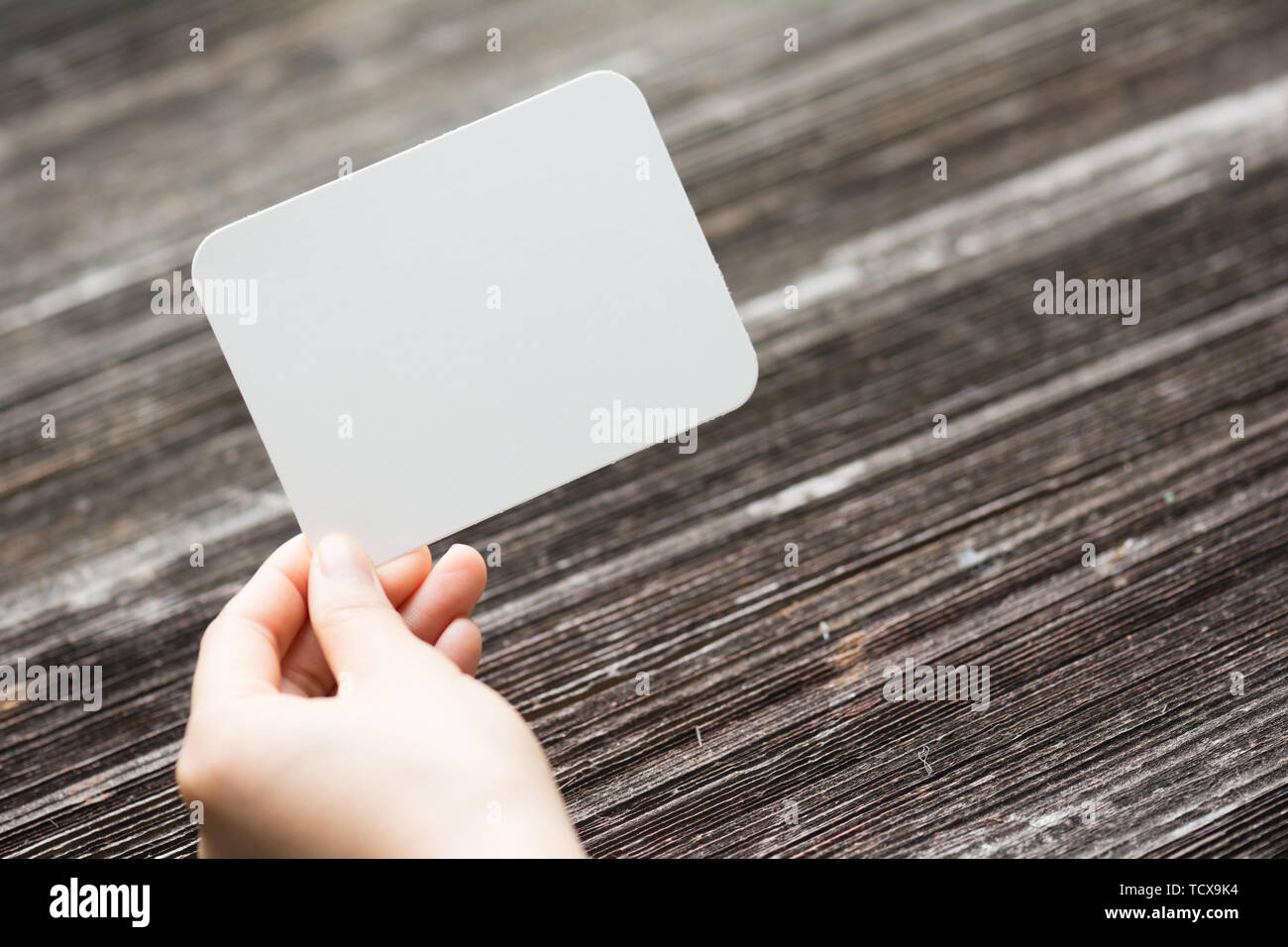Reynolds card with text on old wood plate Stock Photo - Alamy