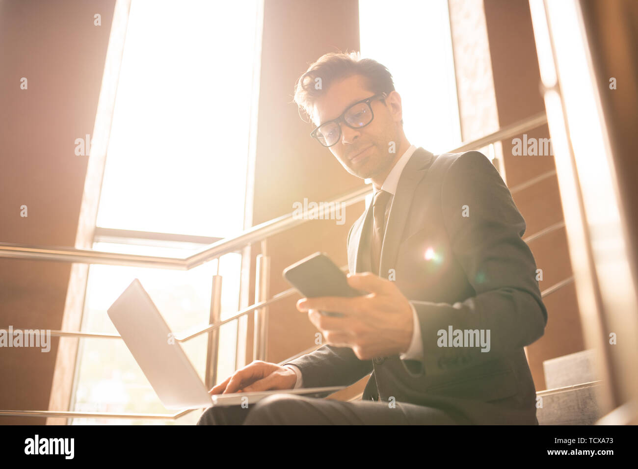Using gadgets hi-res stock photography and images - Alamy