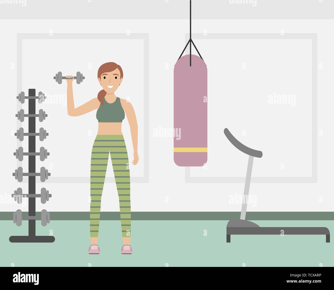 Girl in uniform with dumbbells in the fitness club. Fitness classes ...