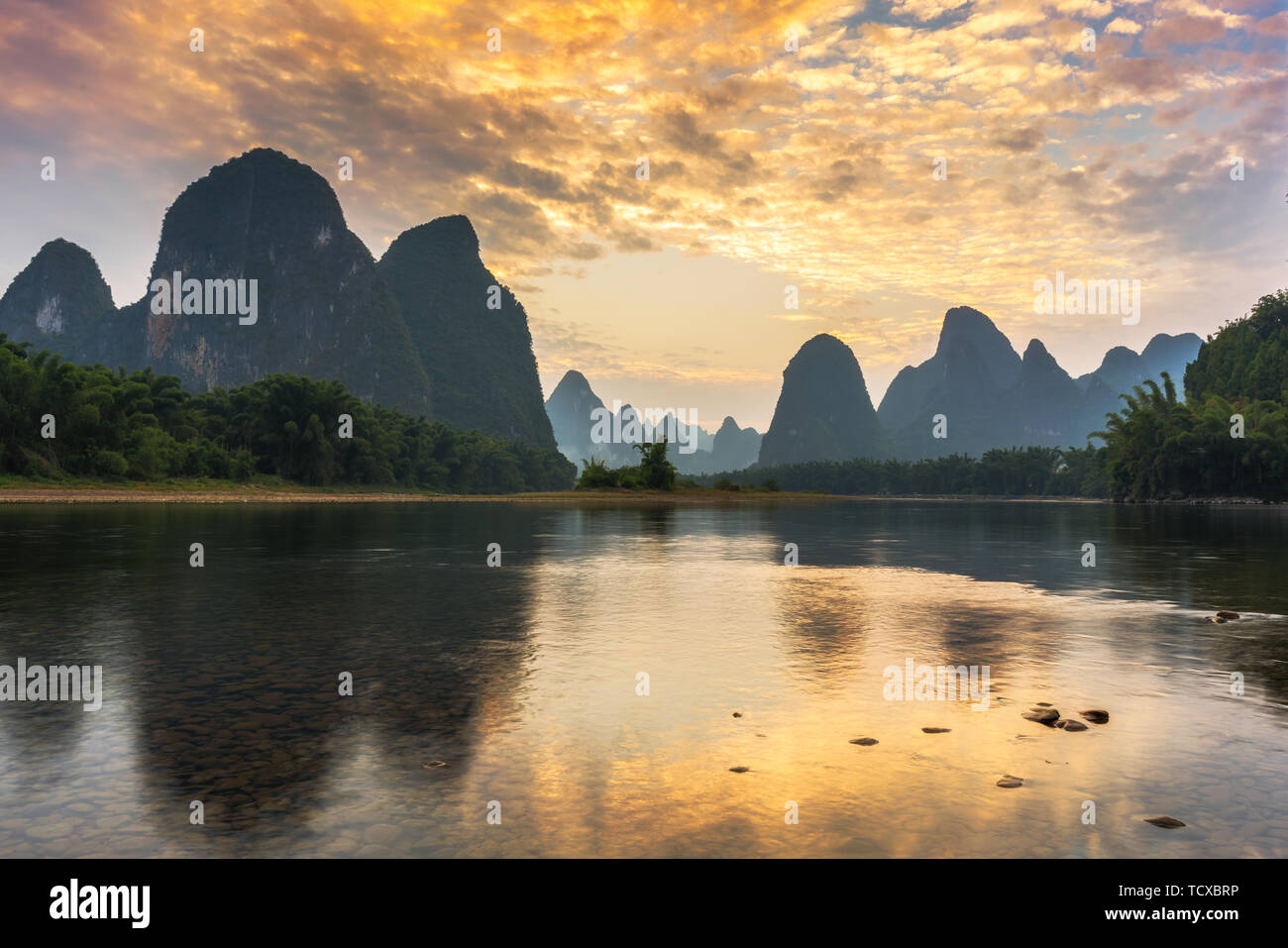 Chinese karst mountains at the yangshuo river at sunrise hi-res stock ...