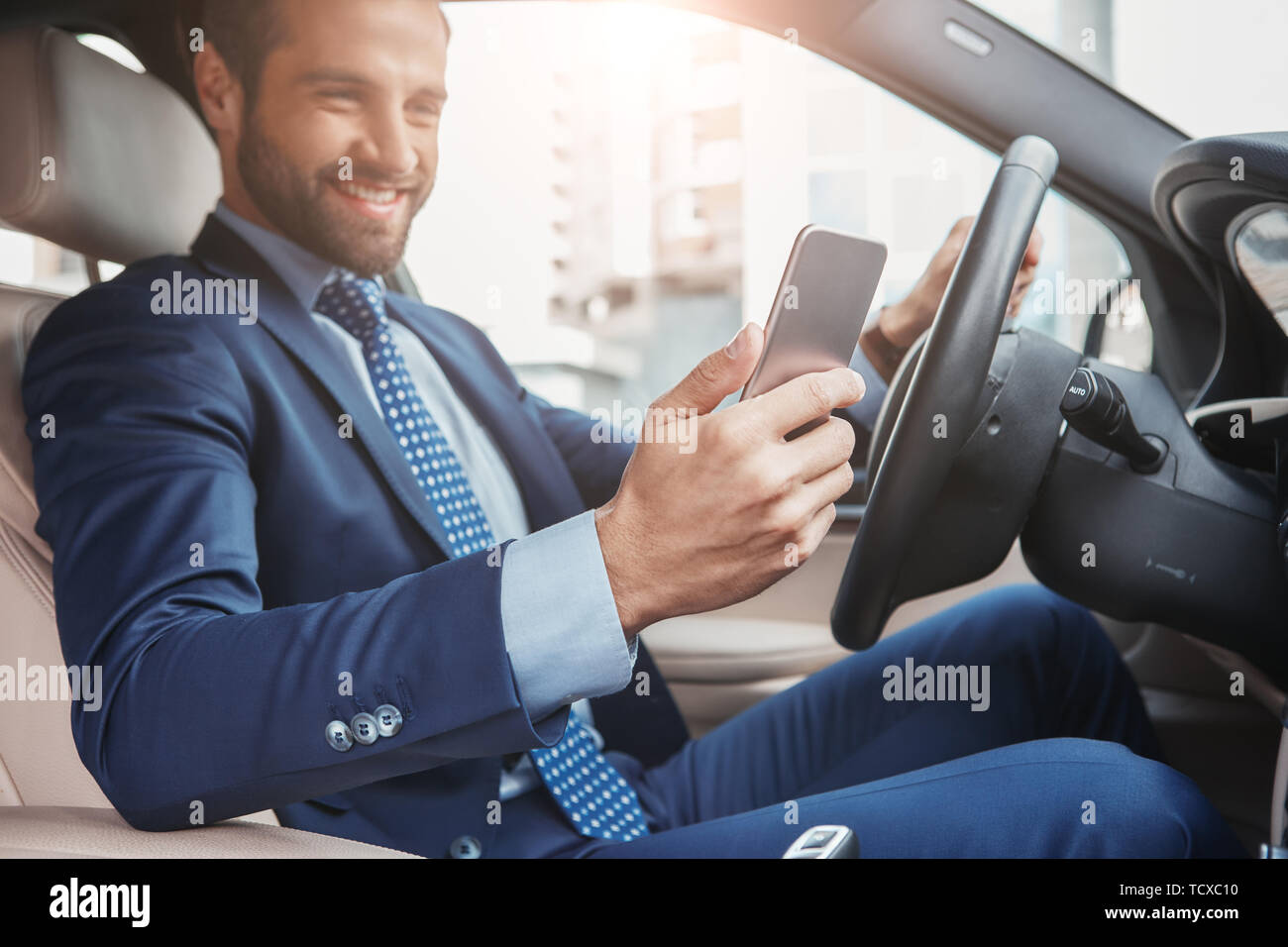 Chat with client. Happy and confident bearded businessman in formal ...