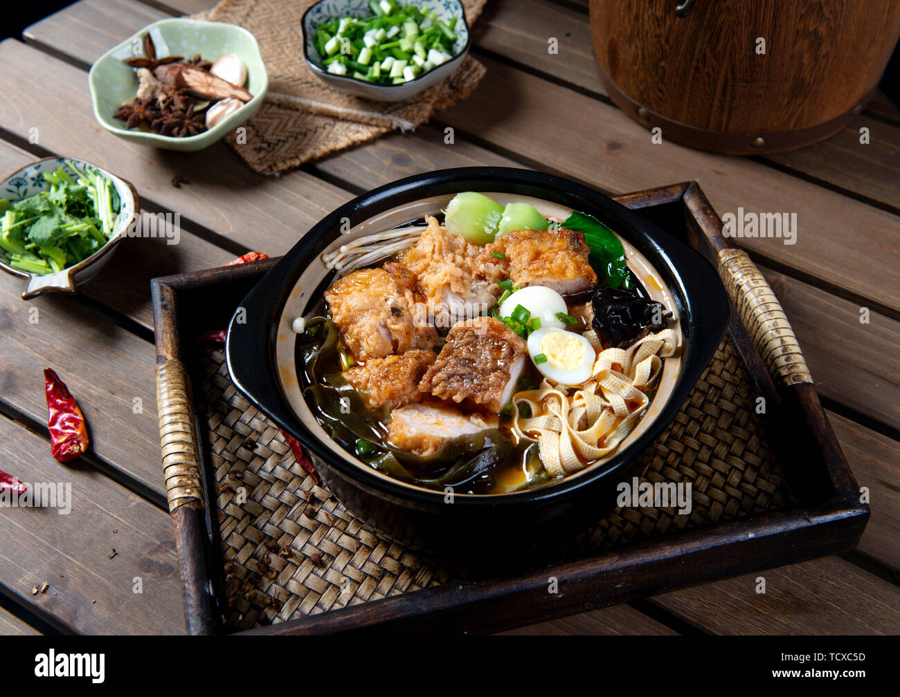 Cheese lotus ribs, chicken nuggets, casserole hot Stock Photo - Alamy