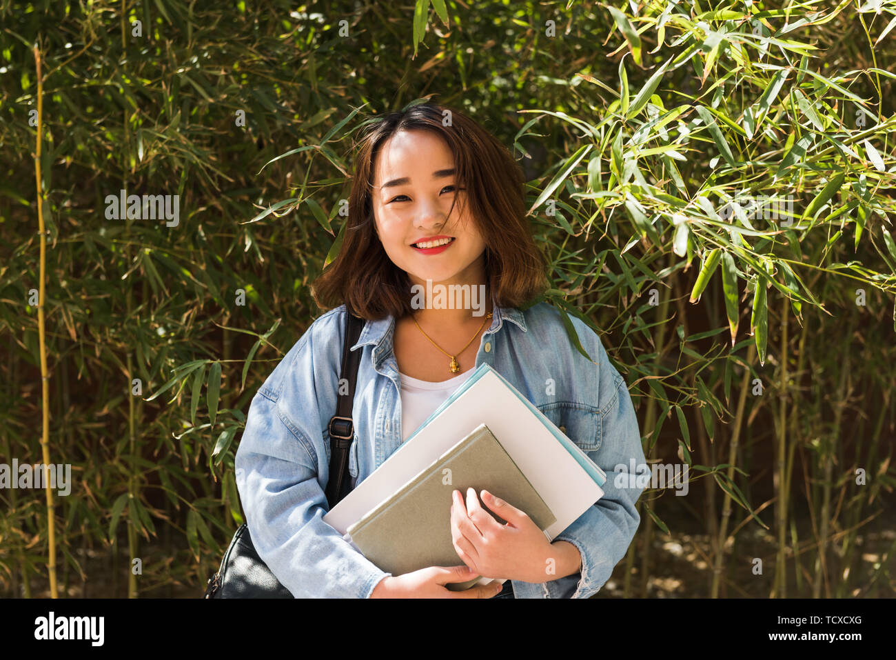 The young, beautiful college girl on campus Stock Photo - Alamy