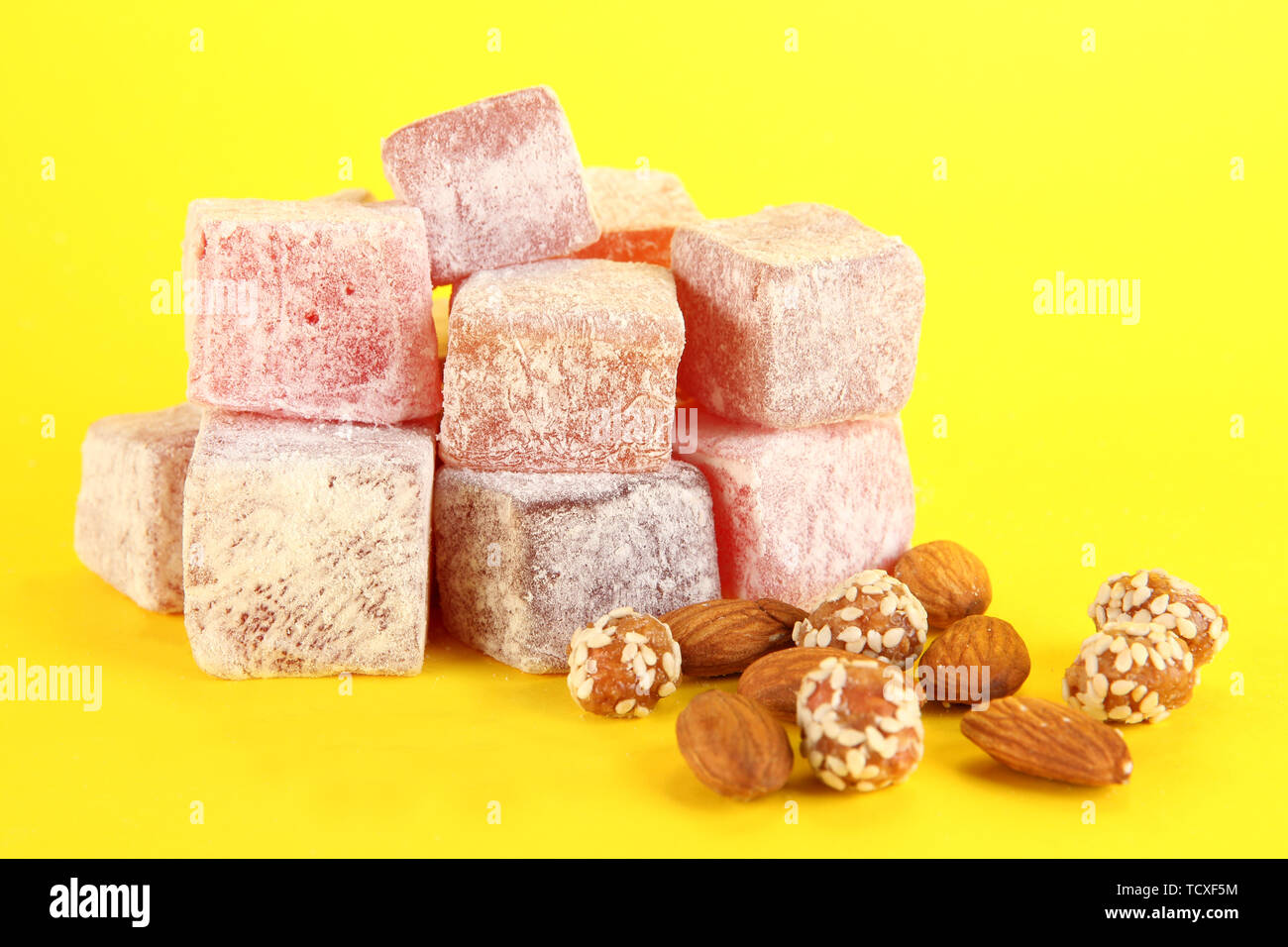 rahat lokum on yellow background Stock Photo - Alamy