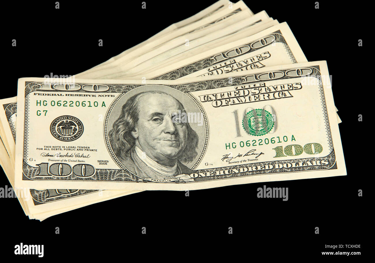 Stack of bills over black hi-res stock photography and images - Alamy