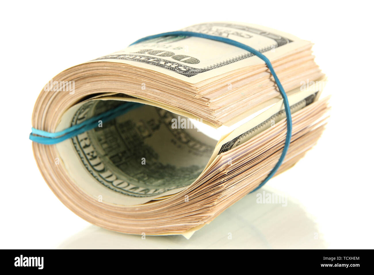 Twisted bundle 100 dollar bills isolated on white Stock Photo - Alamy