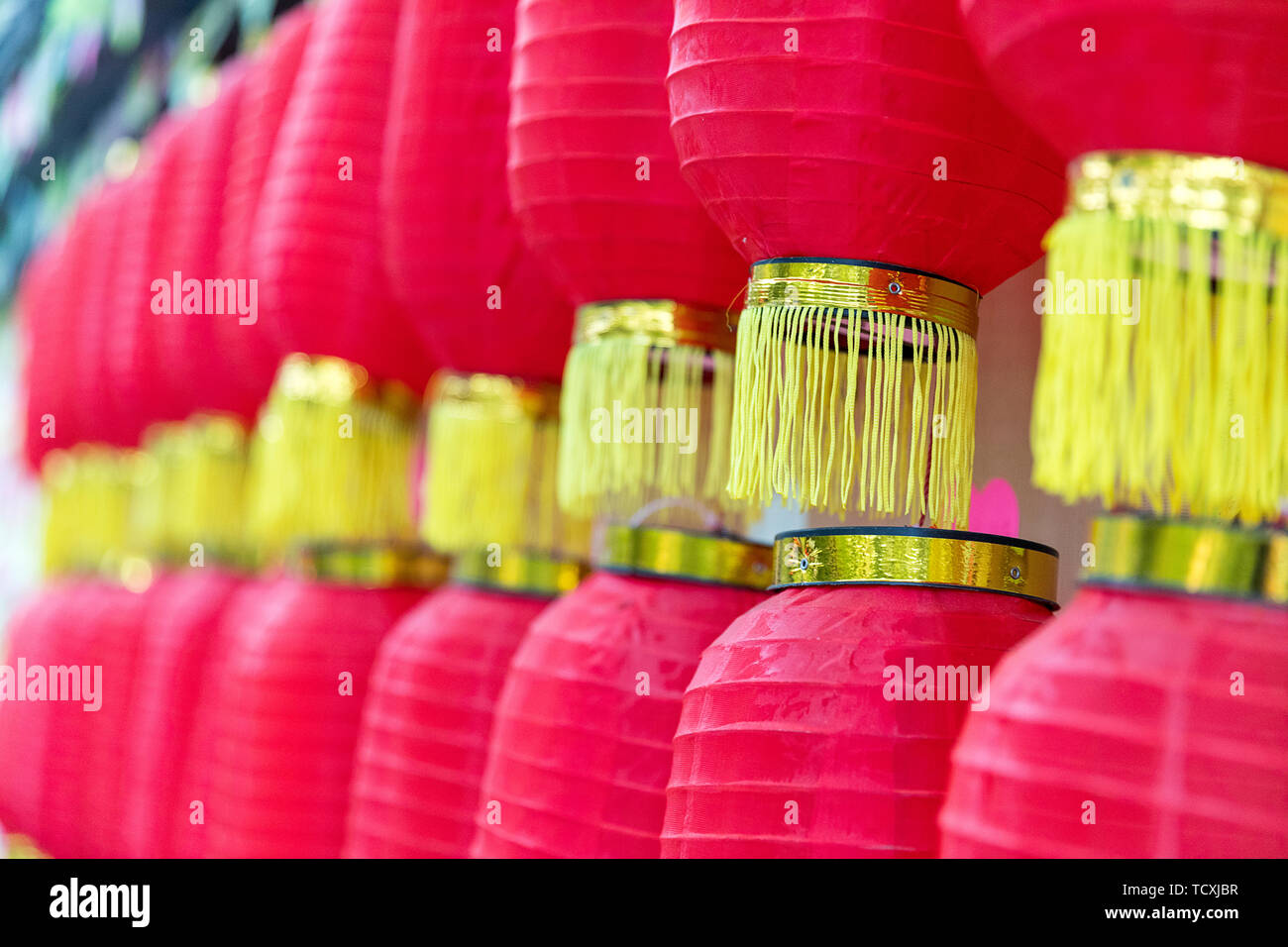Big red lantern hanging high in Chinese New Year Stock Photo - Alamy