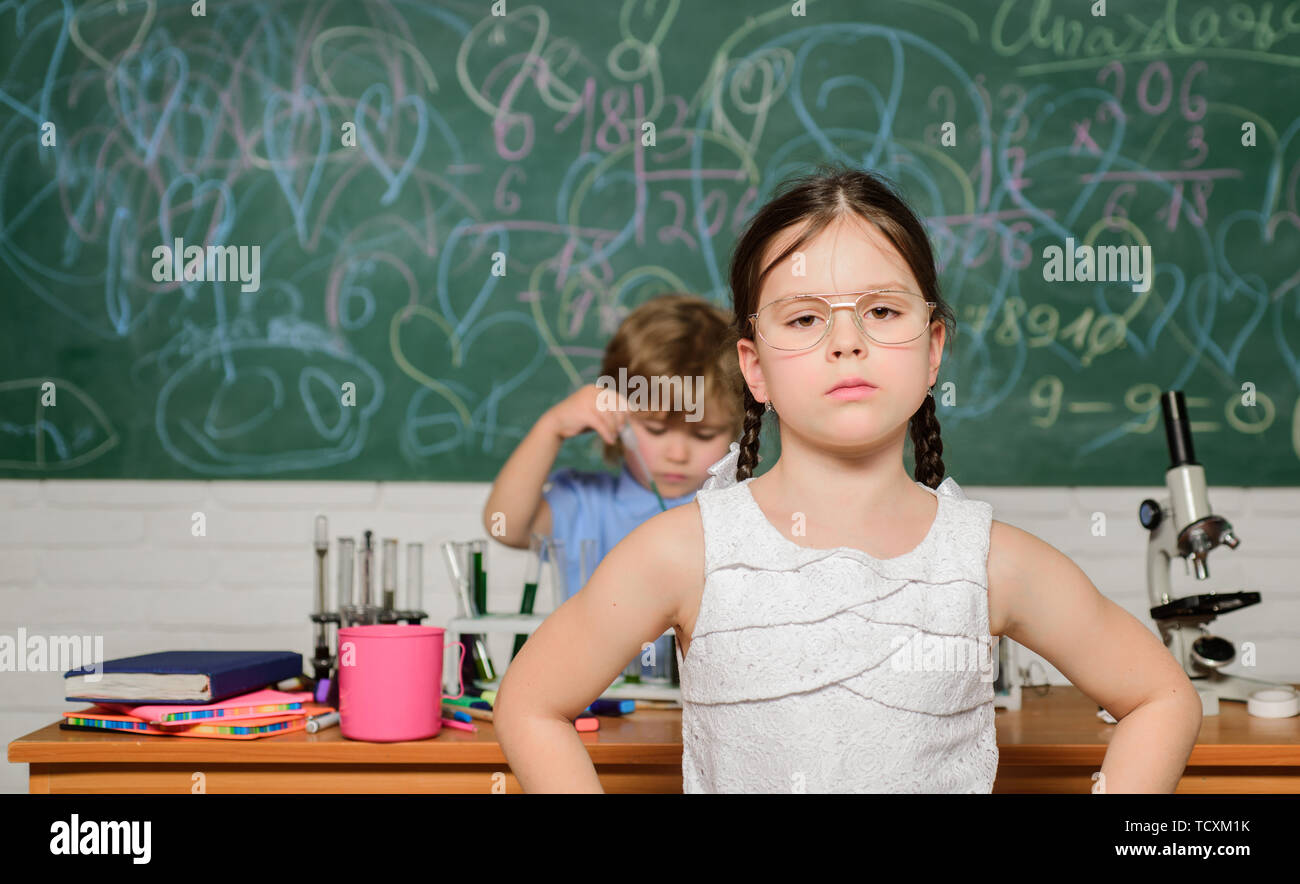 Wunderkind and early development. Smart children performing chemistry ...