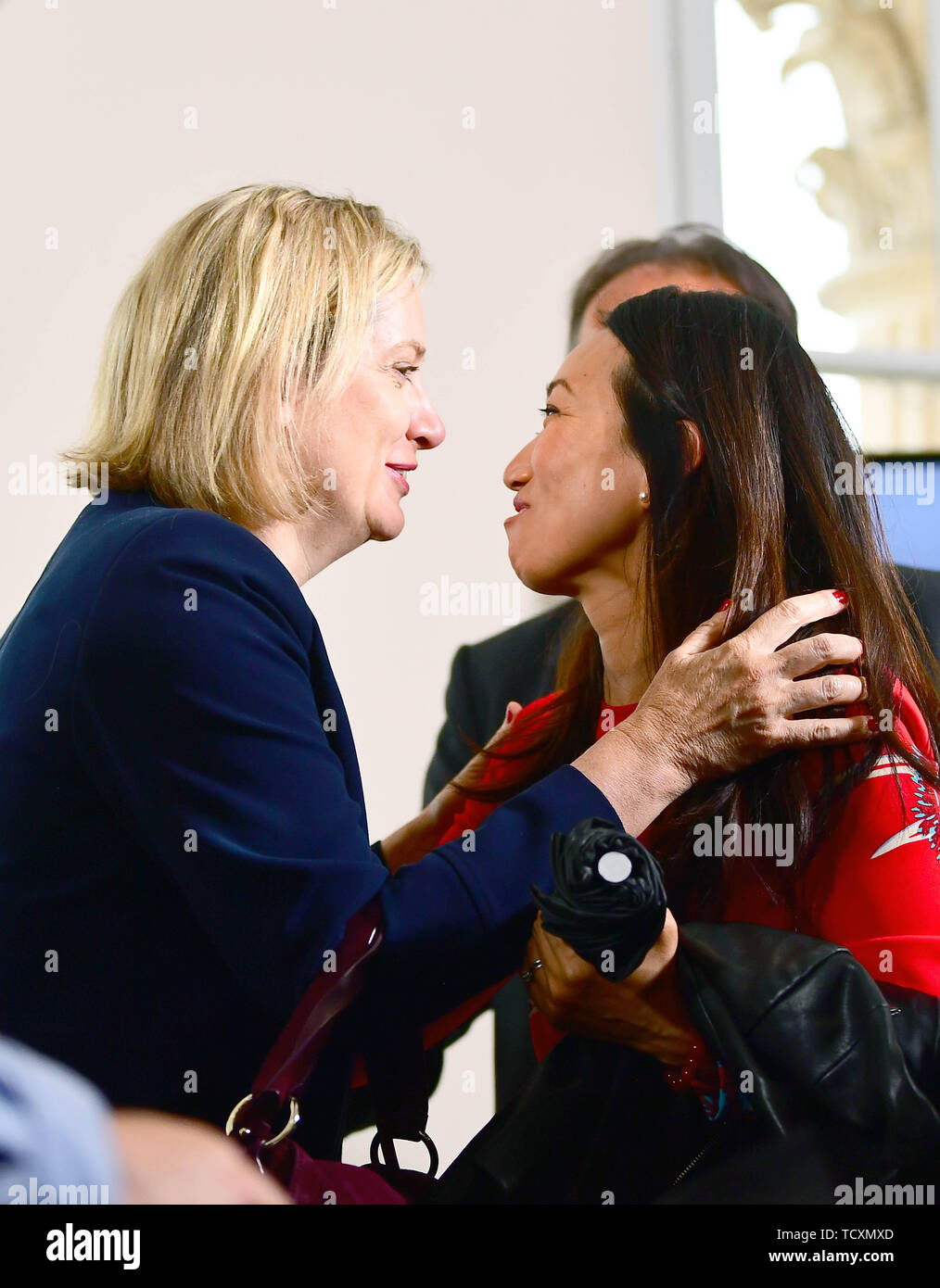 Secretary of State for Work and Pensions Amber Rudd (left) with Lucia ...