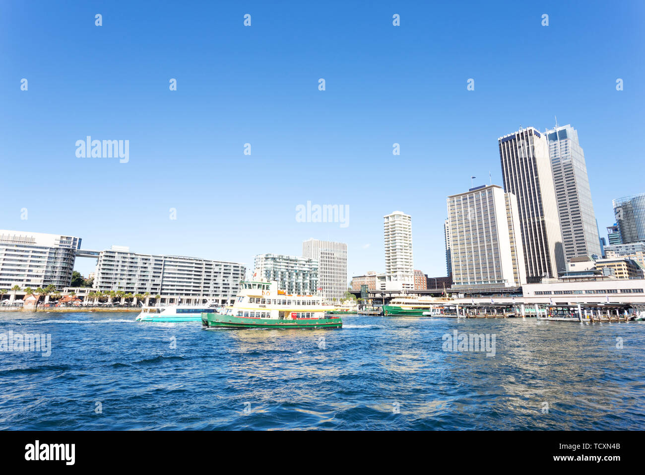 Skyline and office building at seashore Stock Photo - Alamy