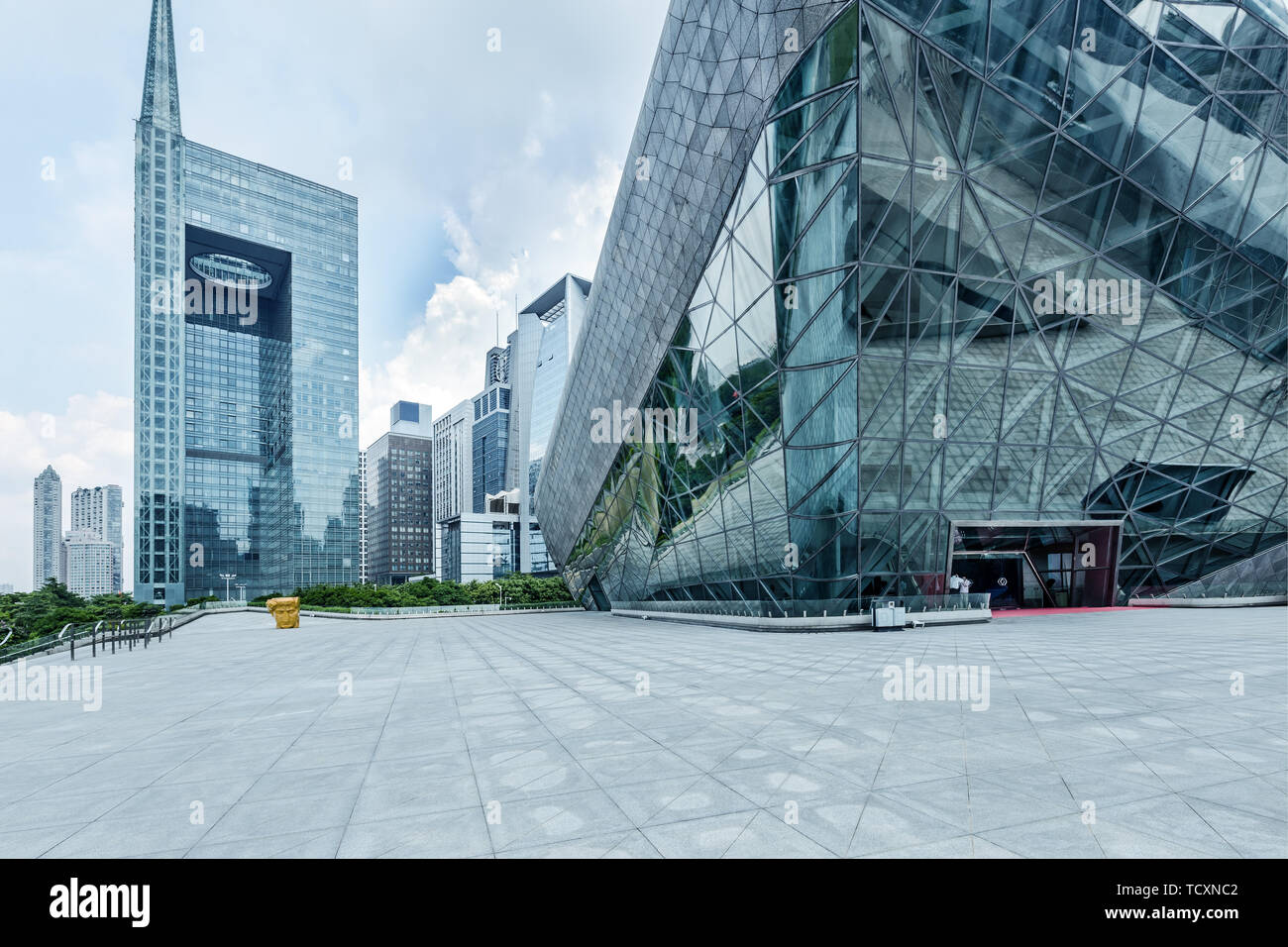 Modern square and skyscrapers Stock Photo - Alamy