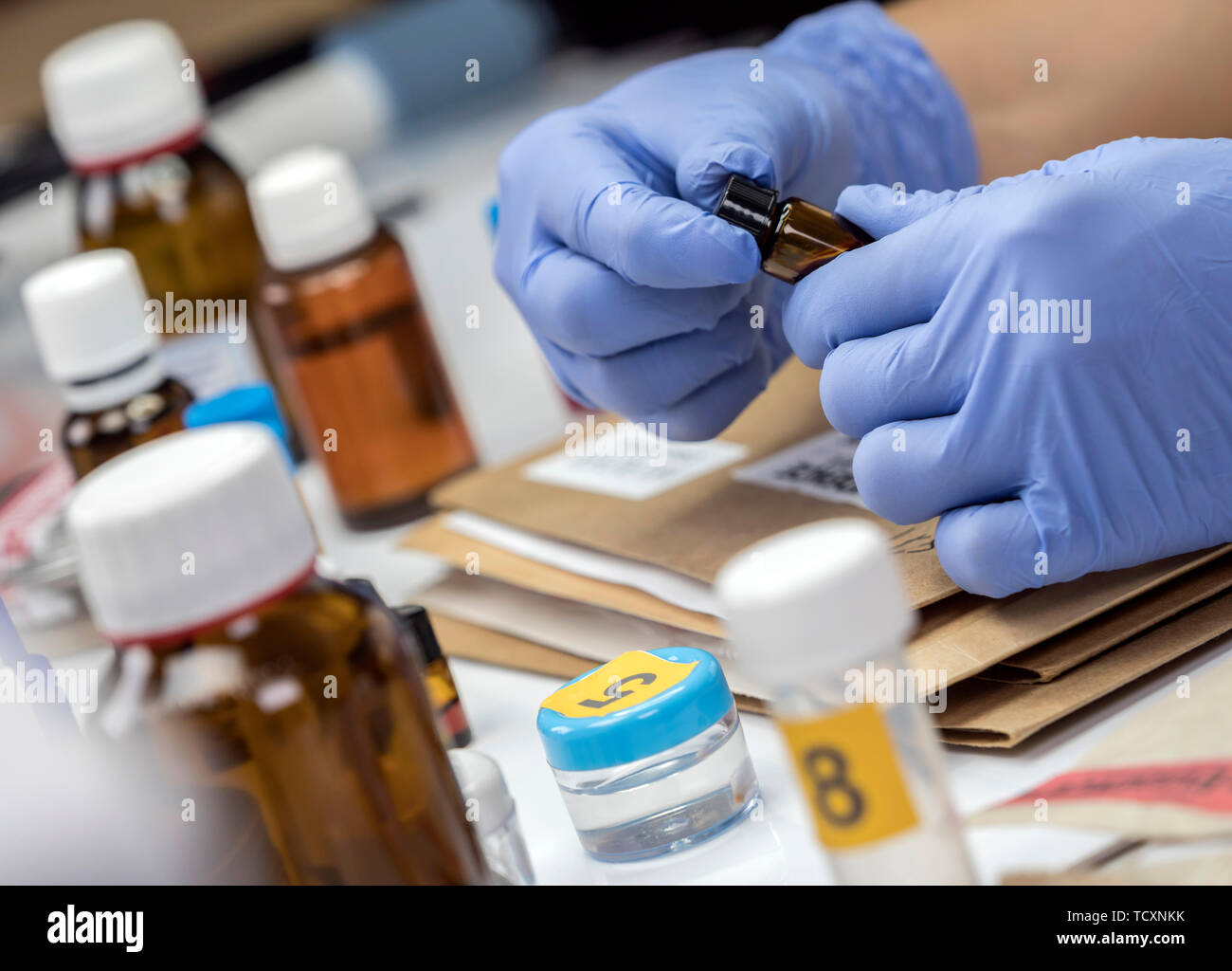 Scientific Police takes blood sample at Laboratorio forensic equipment ...