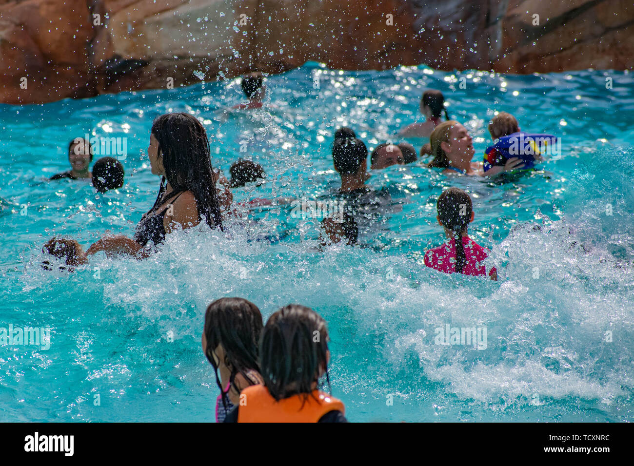 Orlando, Florida. April 07, 2019. Parents and kids having fun pool on ...