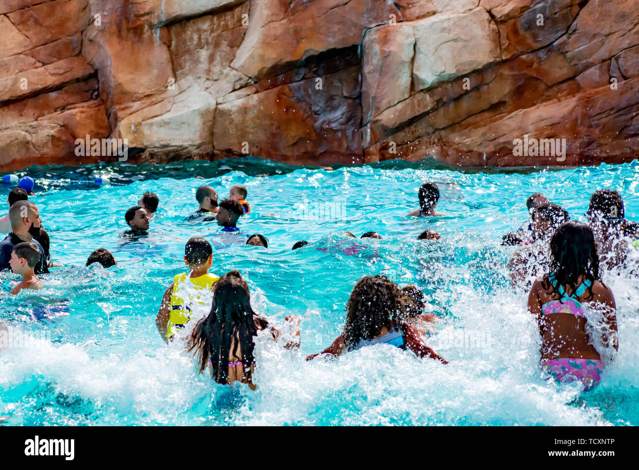 Orlando, Florida. April 07, 2019. Parents and kids having fun pool on ...