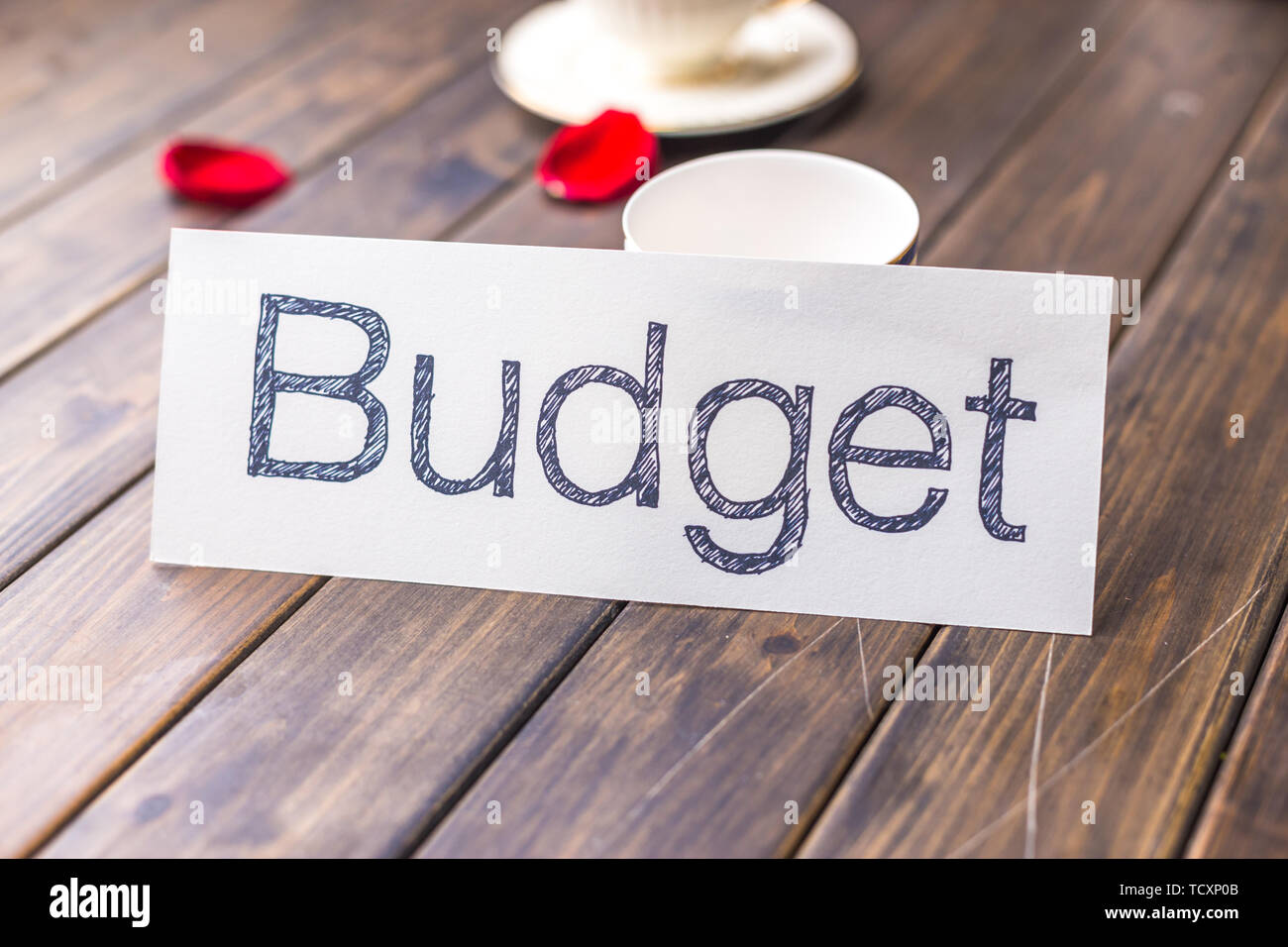 Budget on white paper Stock Photo - Alamy