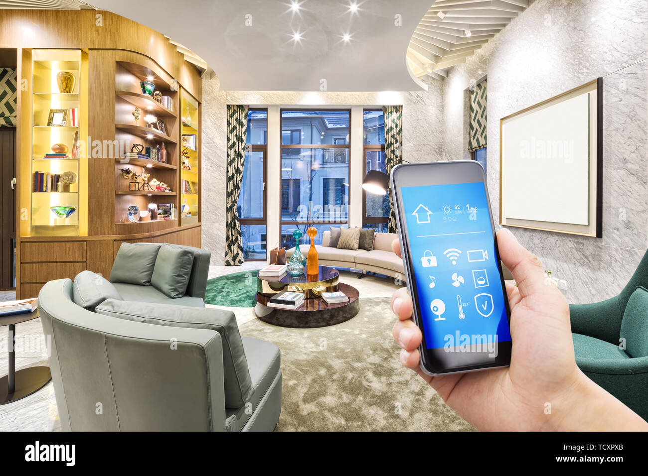 smart phone with smart home with modern living room Stock Photo - Alamy