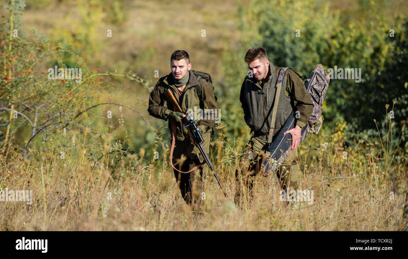 Poacher partner in crime. Activity for real men concept. Hunters ...