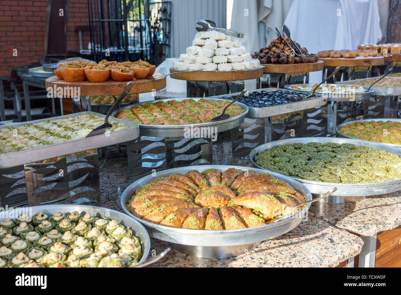 Traditional Turkish sweets at the open buffet in a hotel in Turkey ...