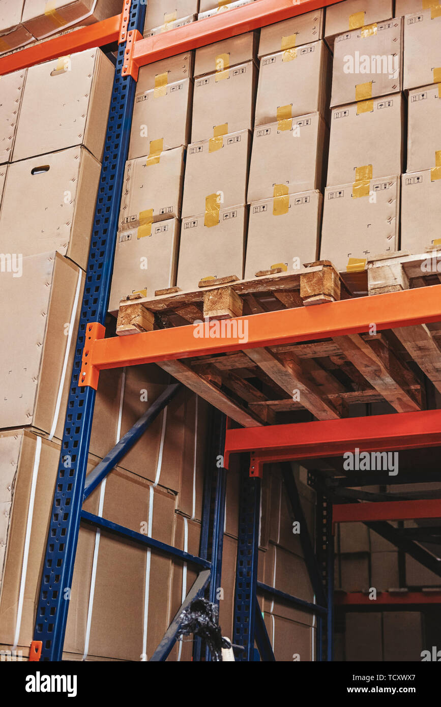 Warehouse and Logistics. The shipment pallet, stack of cardboard boxes ...