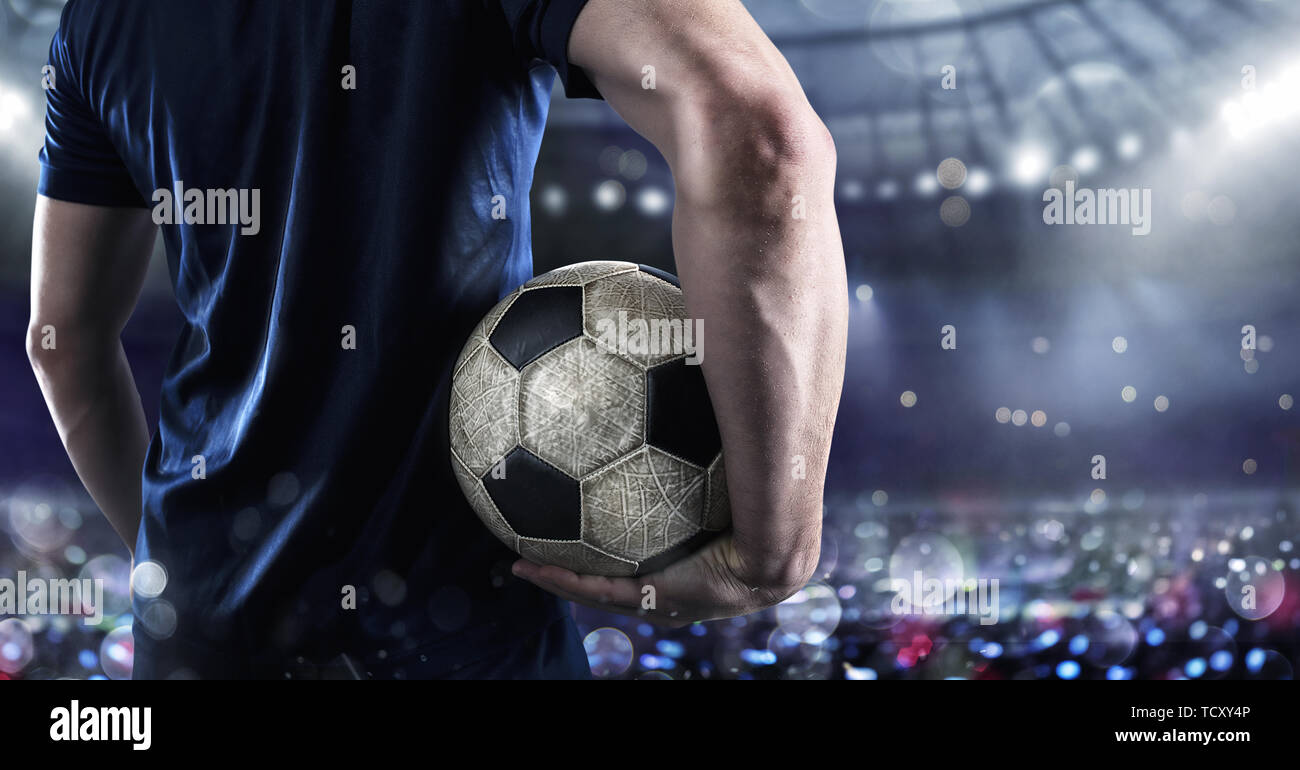 Soccer player ready to play with soccerball at the stadium Stock Photo ...