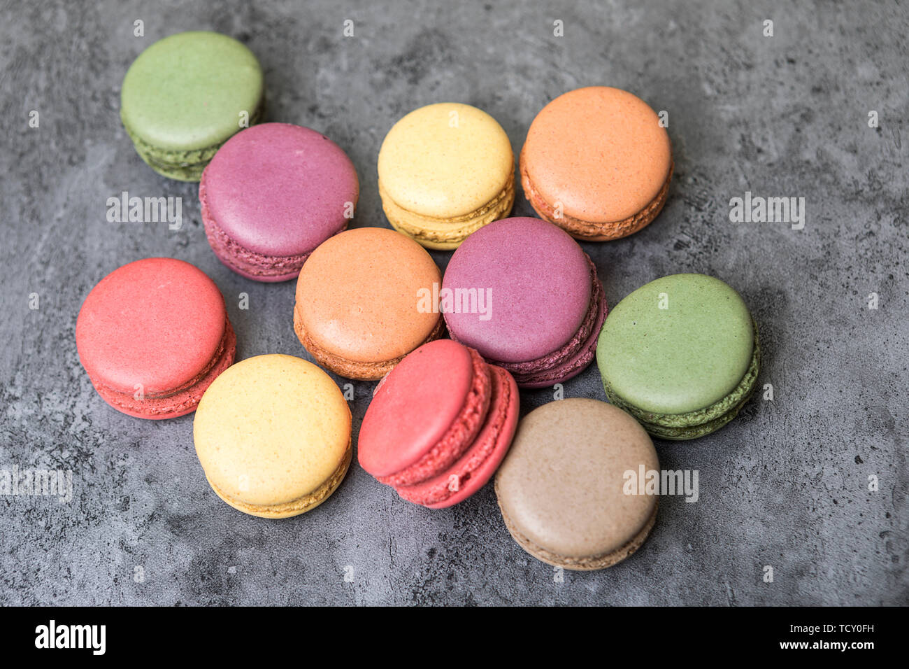 Beautiful macaroon cupcakes on the table Stock Photo - Alamy