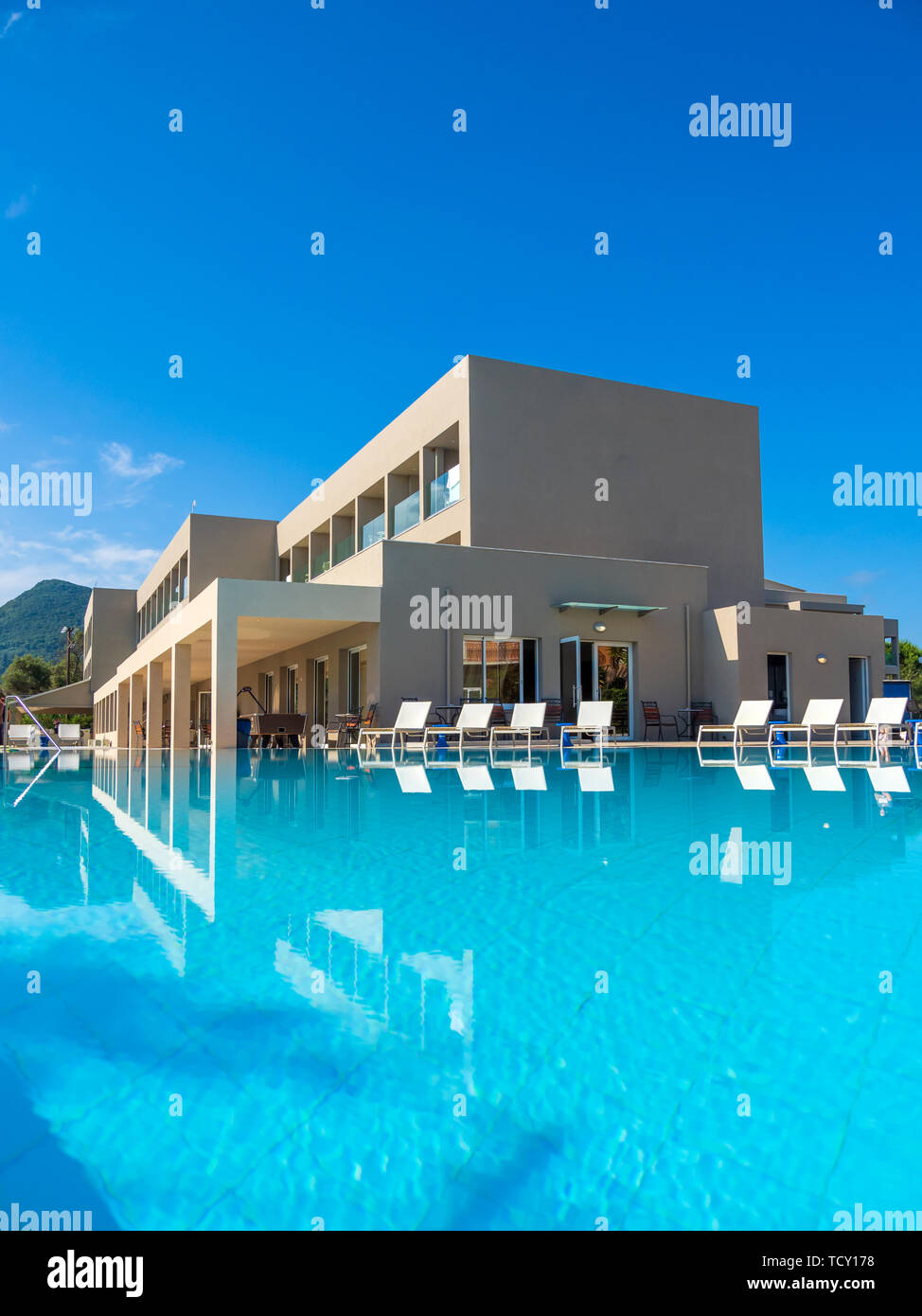 Swimming pool at the summer holydays resort hotel Stock Photo - Alamy