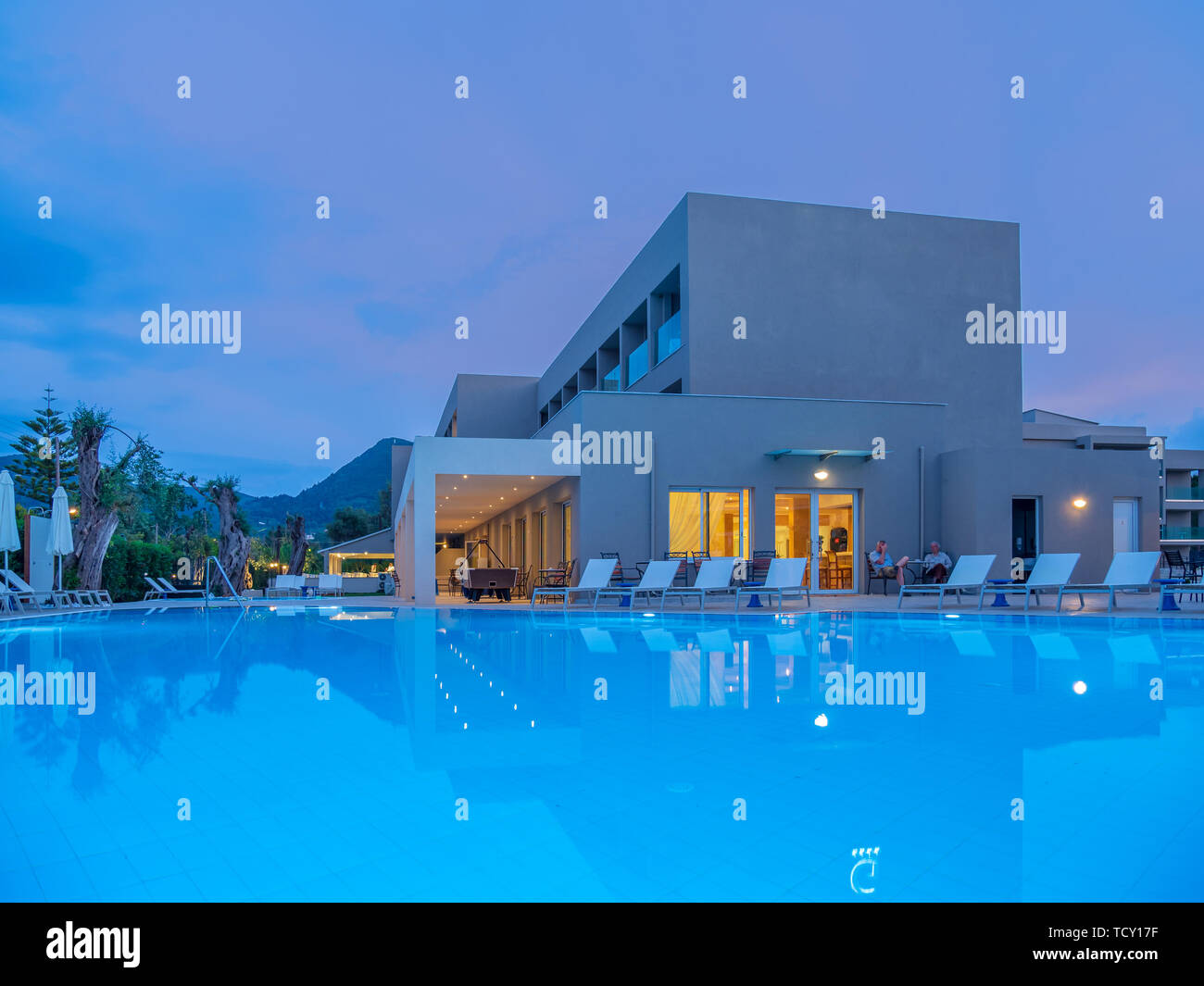 Swimming pool at the summer holydays resort hotel Stock Photo - Alamy