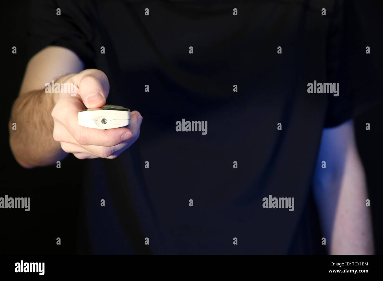 Male hand pointing a remote control hi-res stock photography and images ...