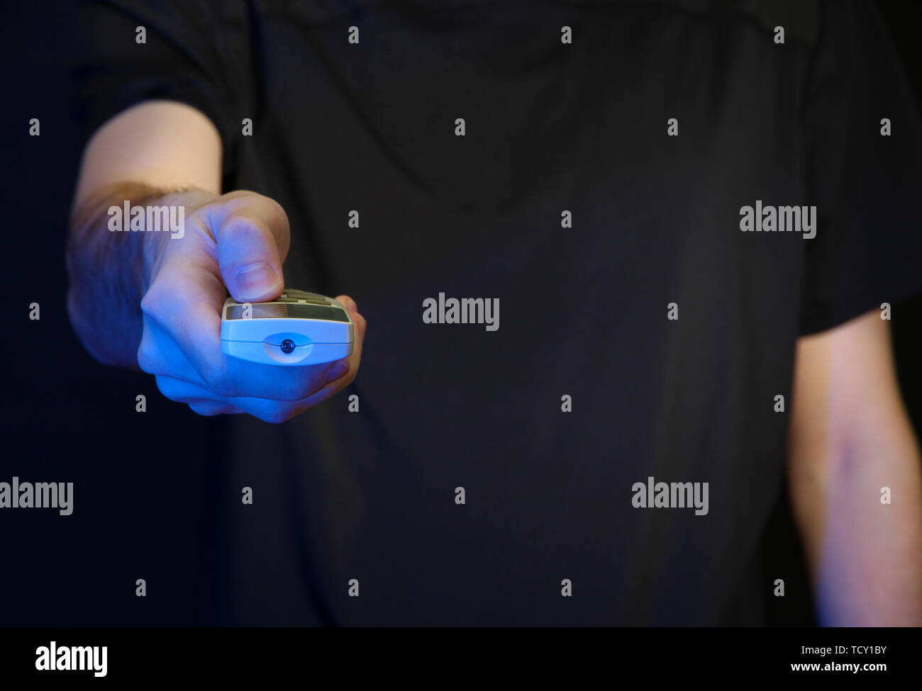 Male Hand Pointing A Remote Control High Resolution Stock Photography ...