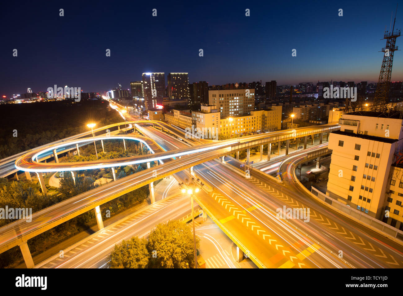 City appearance and transportation system in the evening buildings hi ...