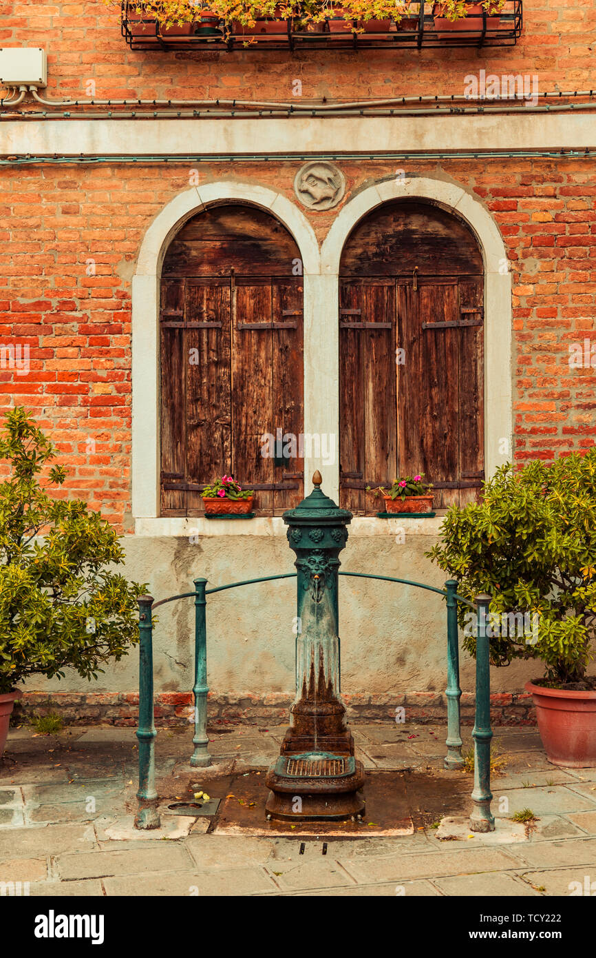 Venice Italy - May 25, 2019: Anceint venetian water pump on Murano ...