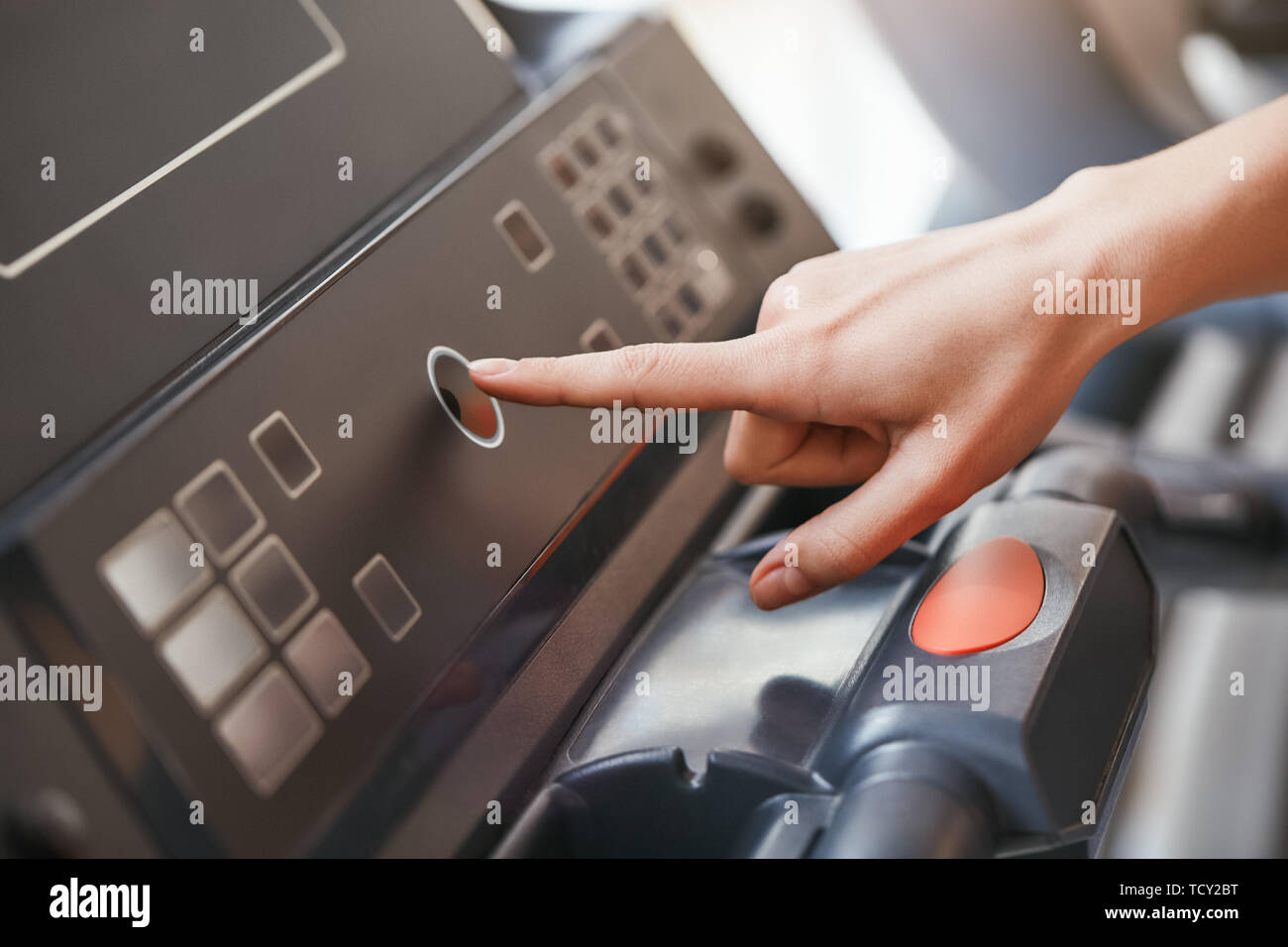 I am ready to workout! Close up photo of woman hand pushing a start ...
