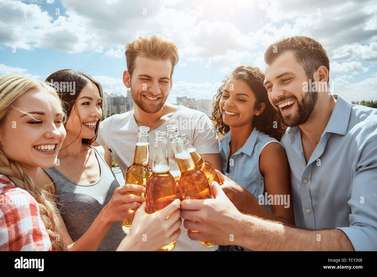 Garden summer friends group standing hi-res stock photography and ...