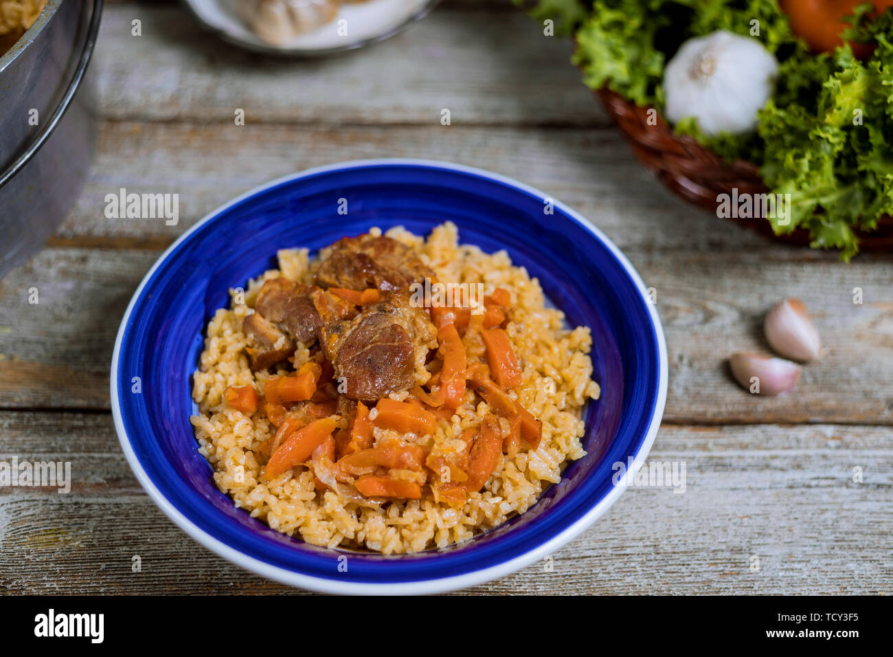 Samarkand pilaf lamb, rice, onion, yellow carrots, vegetable spices on ...